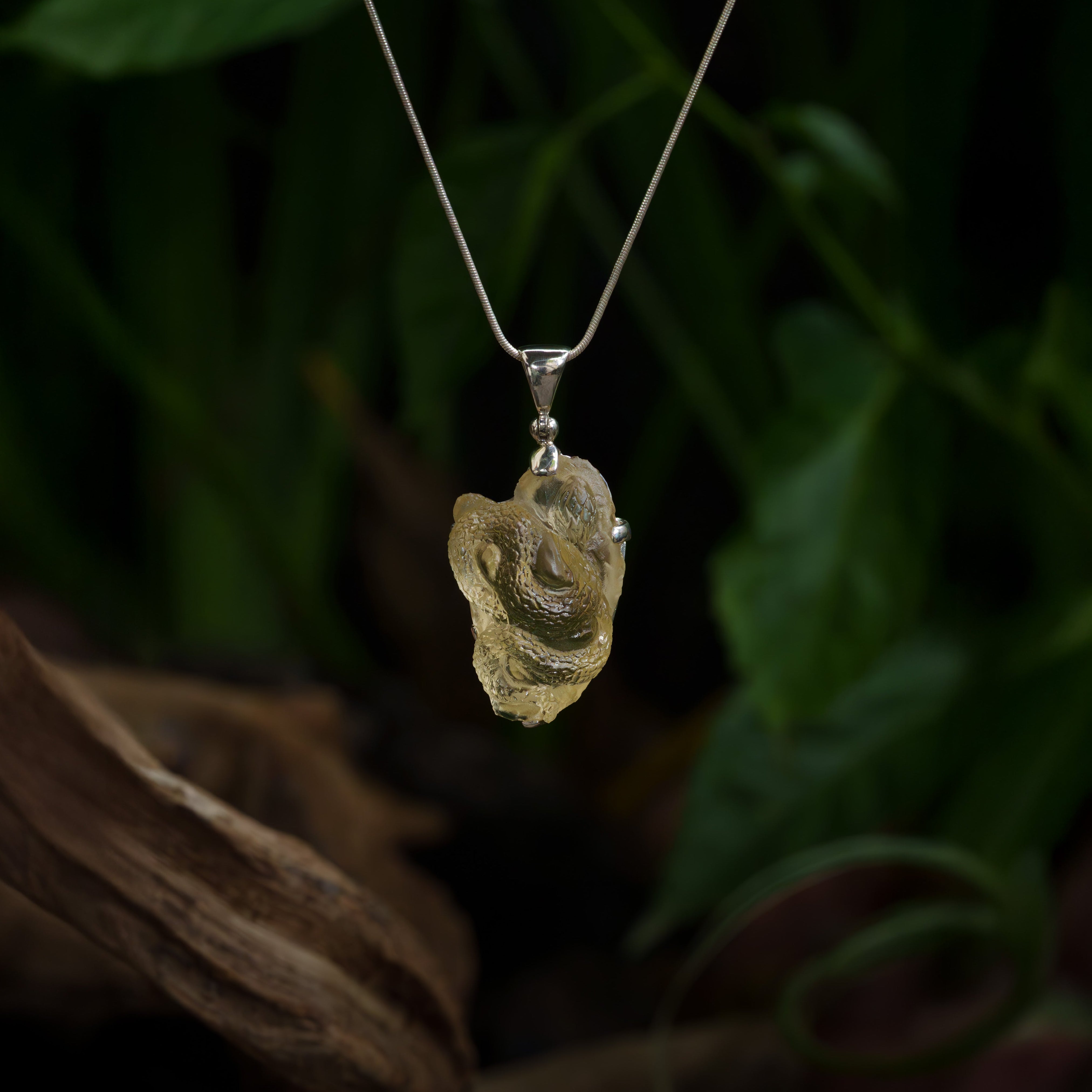 Starborn Hand-Carved Mexican Sunstone Snake Pendant in Sterling Silver