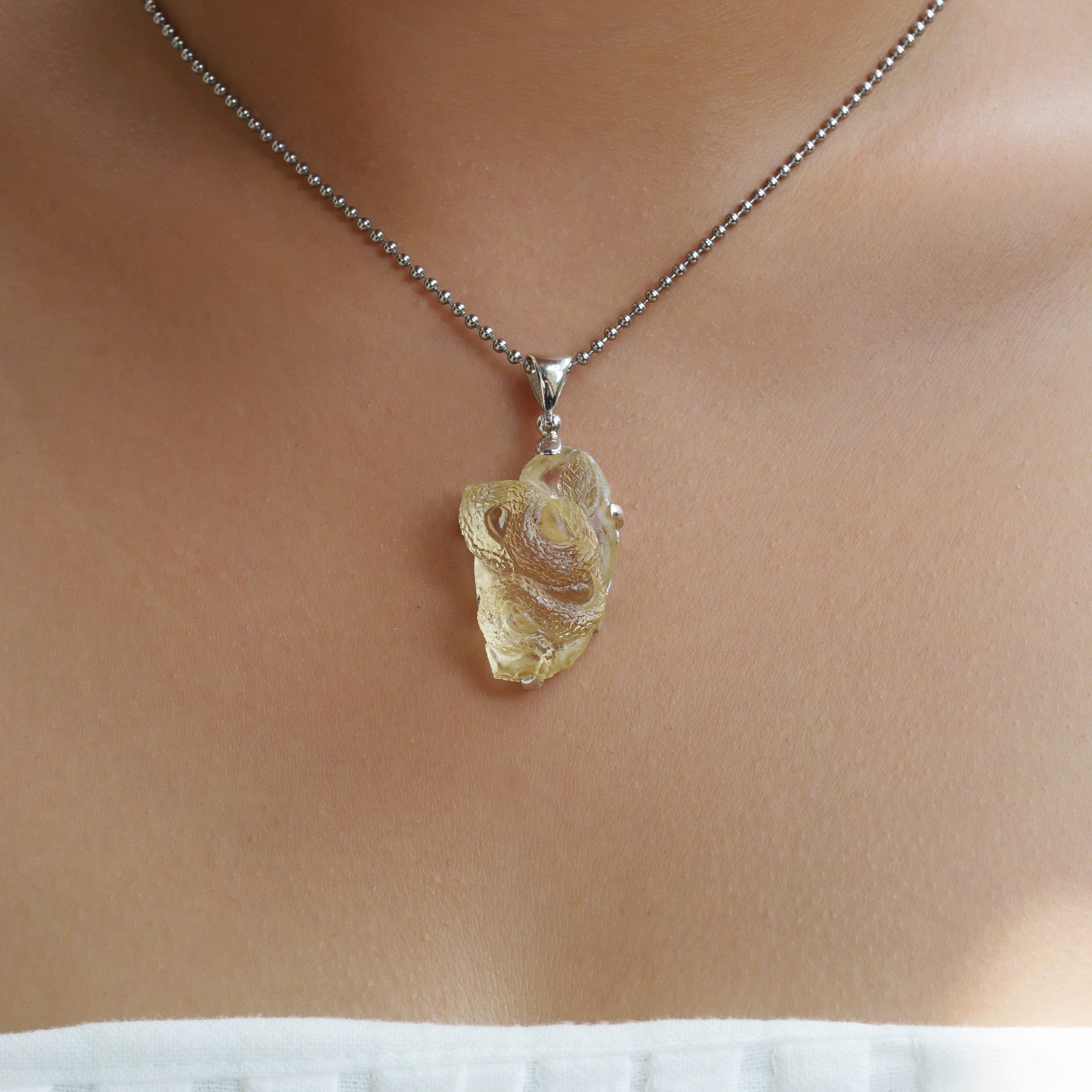 Starborn Hand-Carved Mexican Sunstone Snake Pendant in Sterling Silver